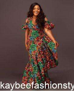 Latest Wrapper Gown Styles for Ladies in 2023 and 2024 - Kaybee Fashion ...